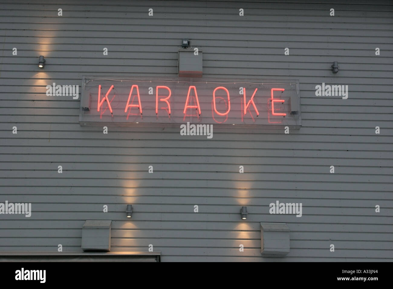 karaoke neon sign on wall Stock Photo - Alamy