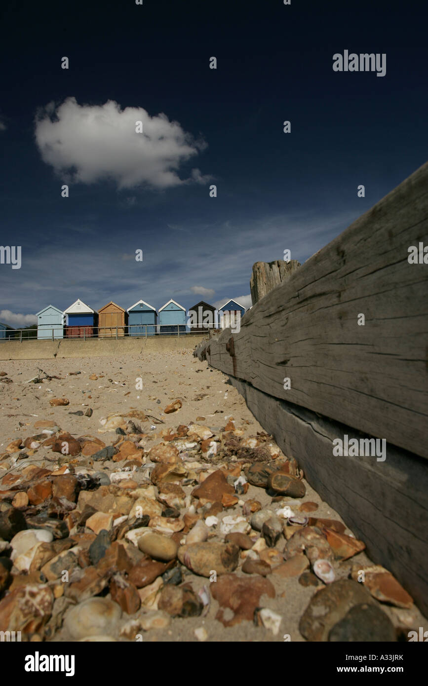 a polarized beach scene at avon beach christchurch with beach huts and ...