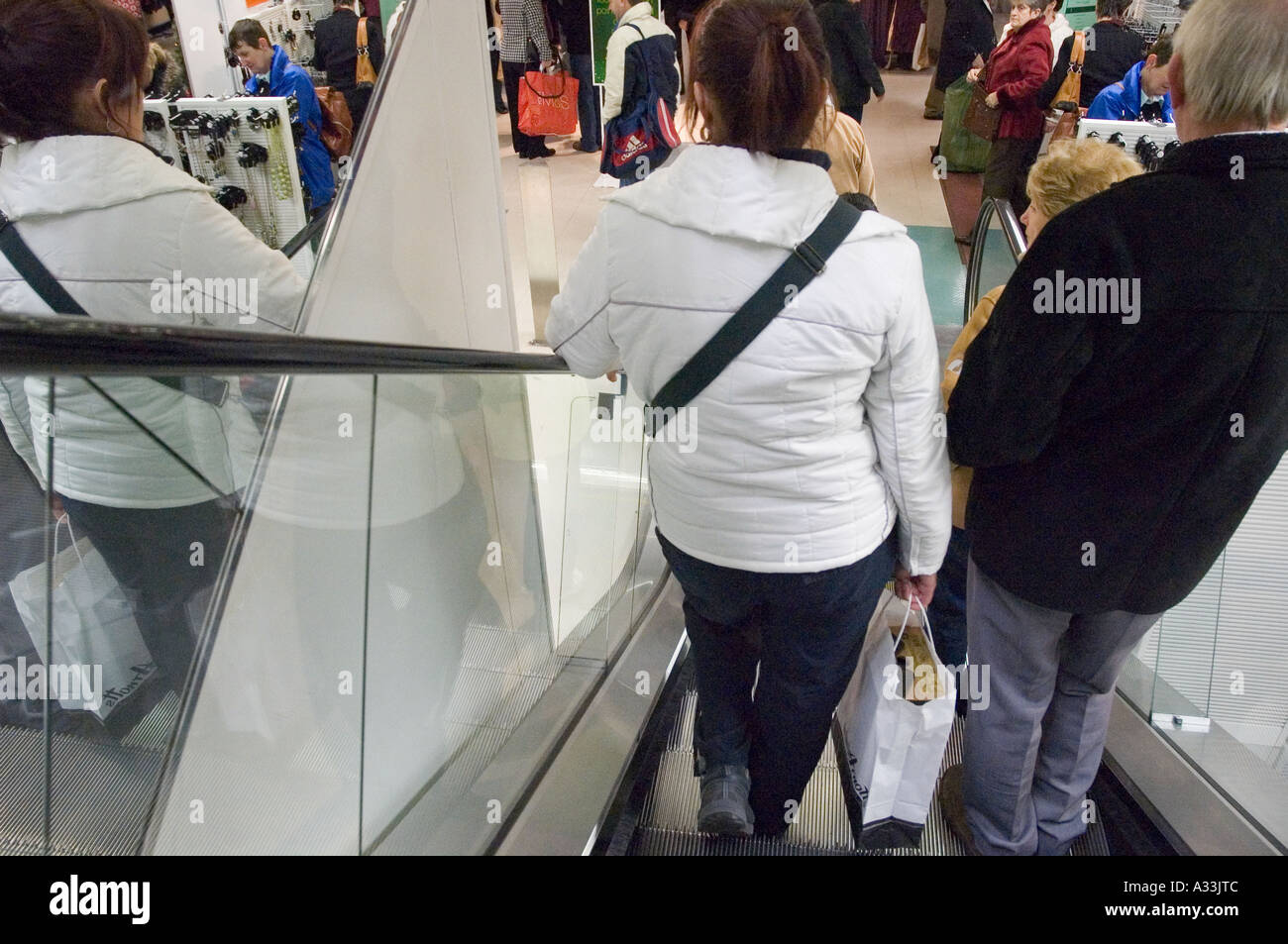Shoppers on department store escalators during the sales Dublin ...