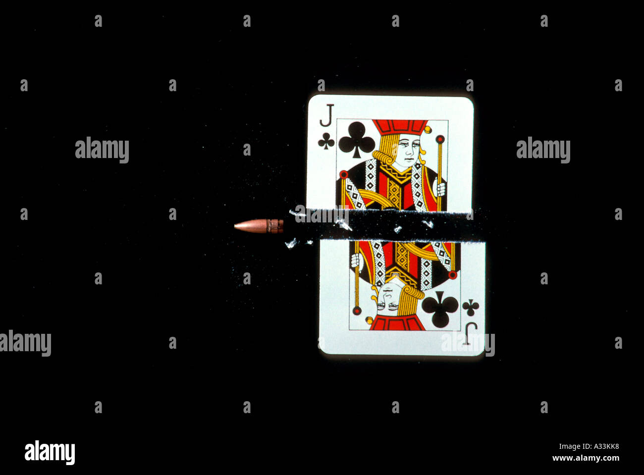 Bullet cutting card Stock Photo - Alamy
