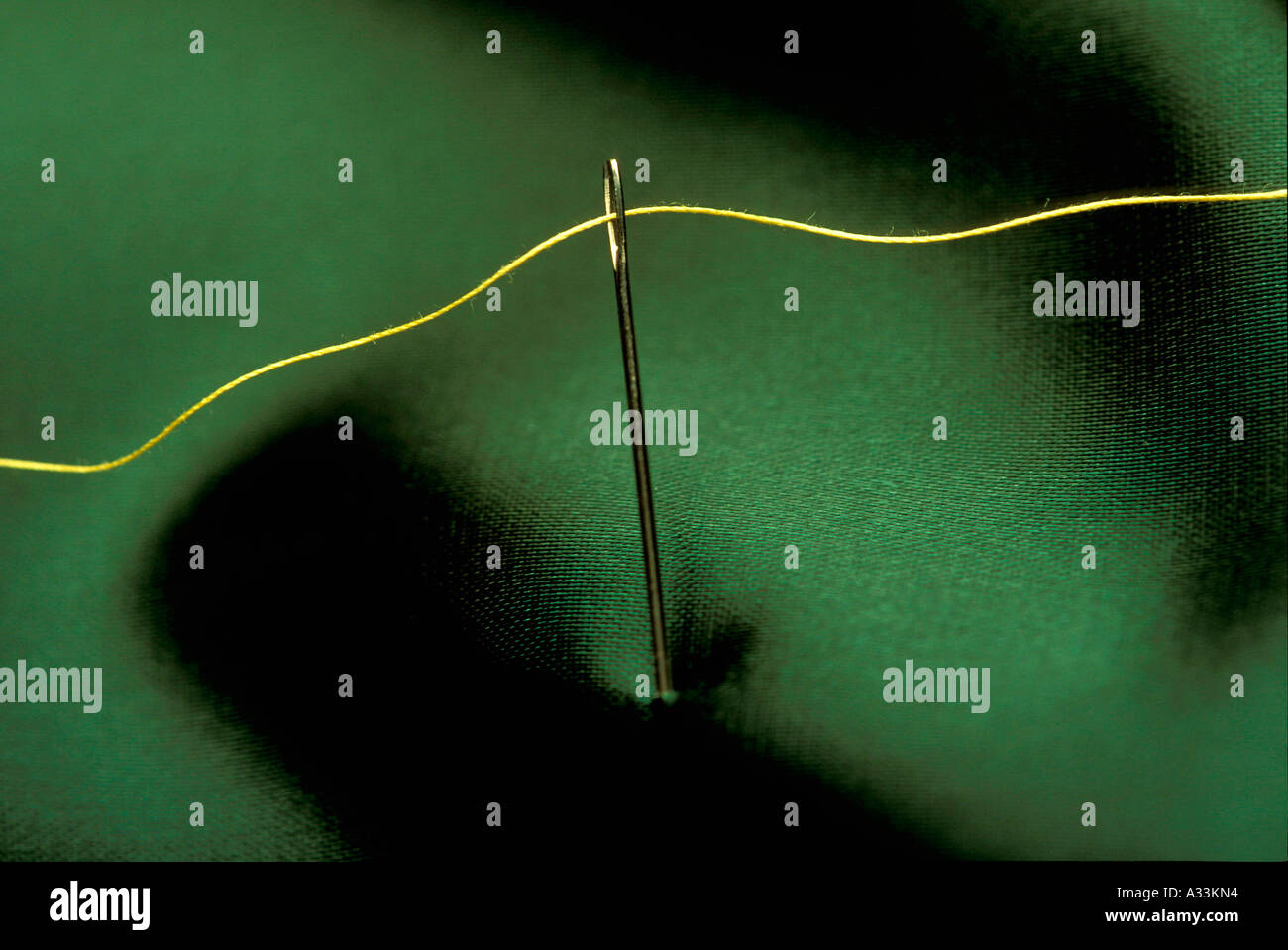 Needle and thread Stock Photo - Alamy