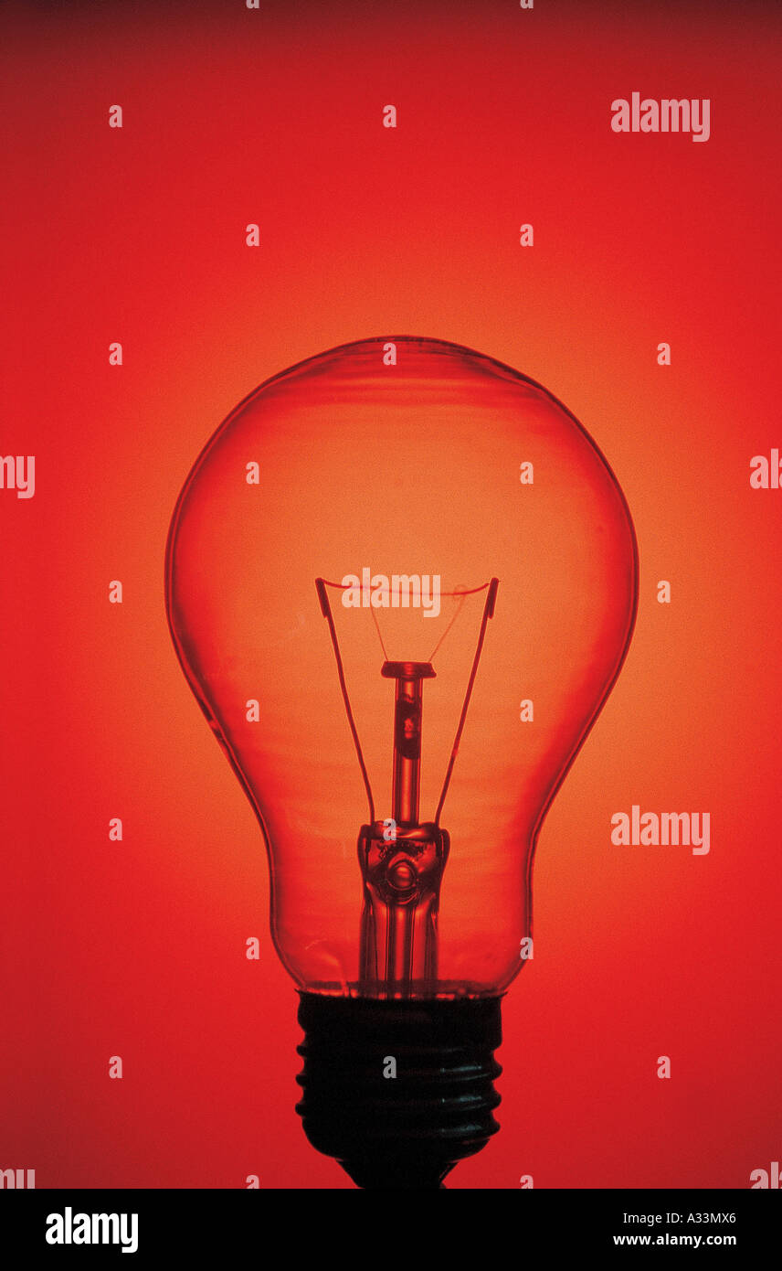 a light bulb and red background Stock Photo - Alamy