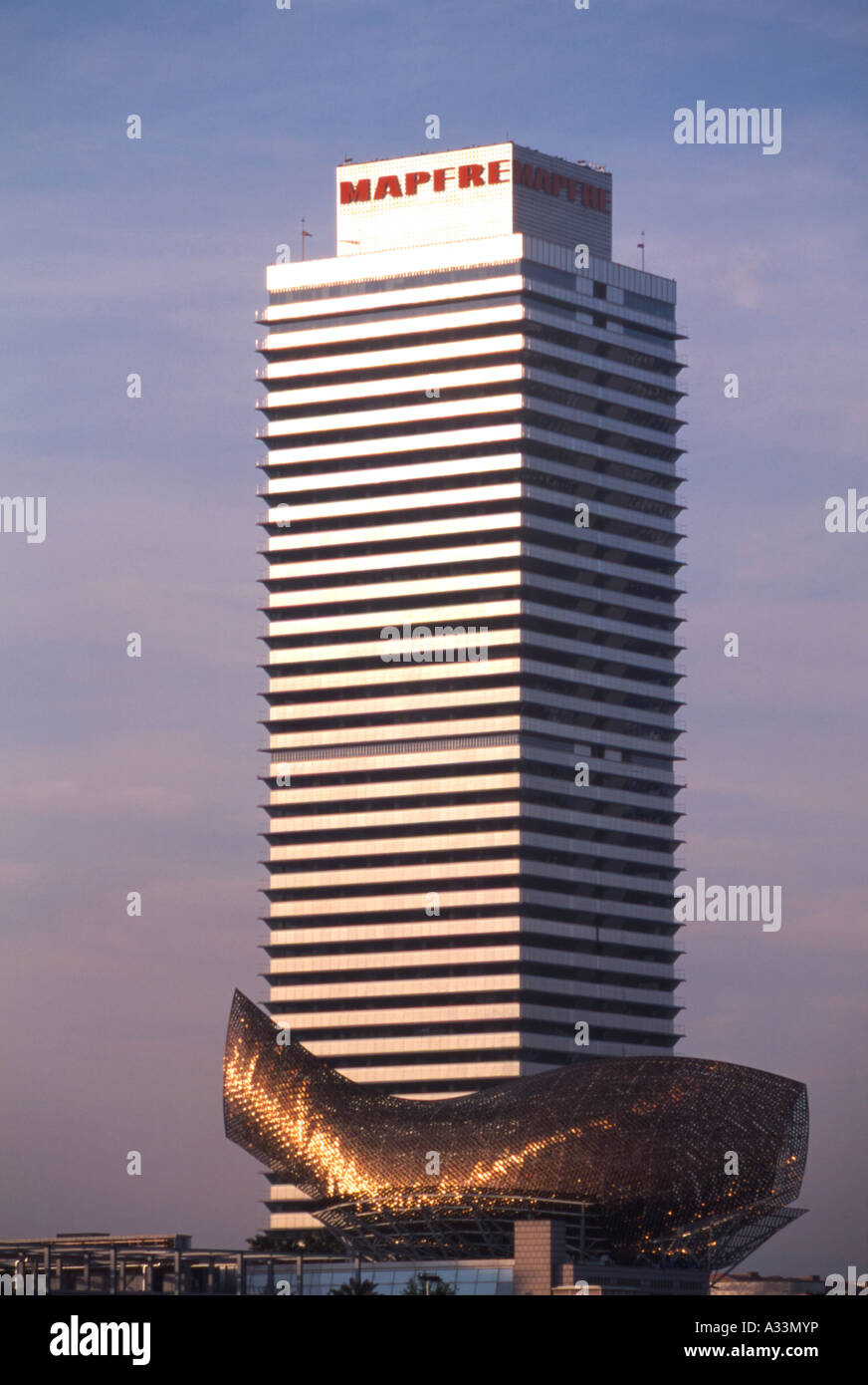Torre Mapfre building and the Peix fish sculpture at Port Olimpic ...