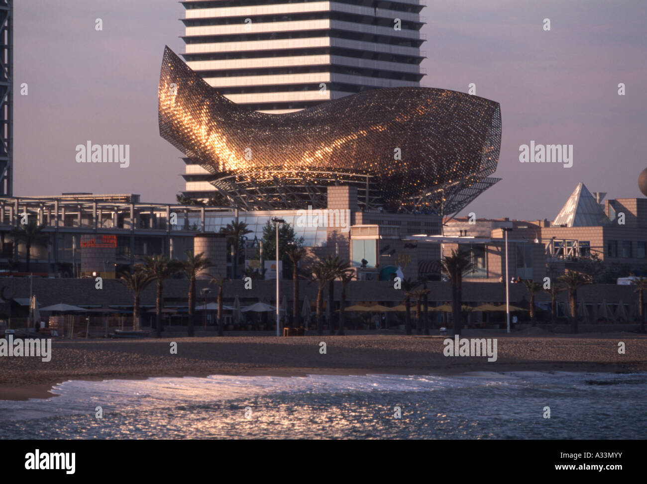 Torre Mapfre building and the Peix fish sculpture at Port Olimpic ...