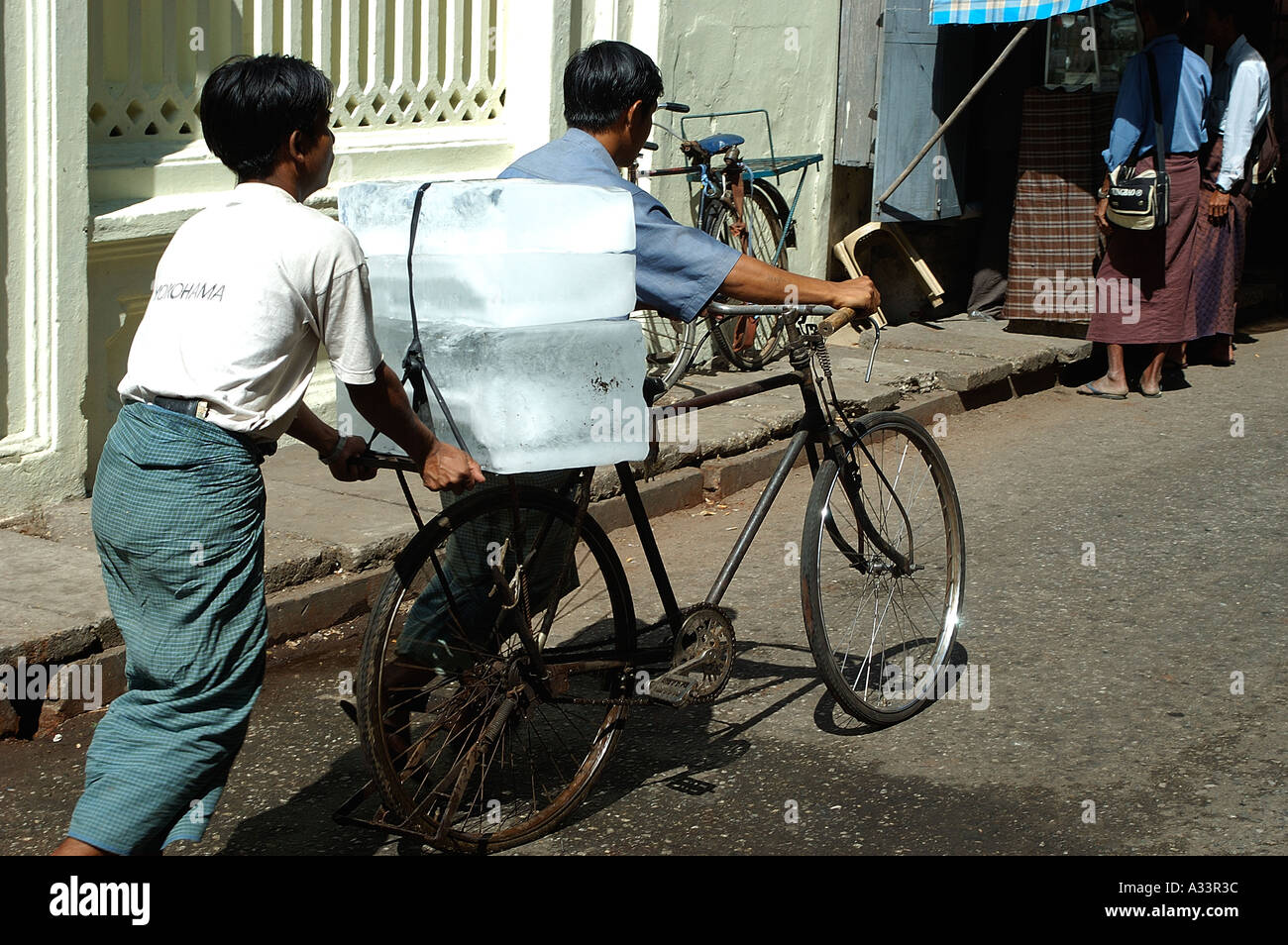 bicycle transporting ice Yangon Burma Myanmar Stock Photo - Alamy
