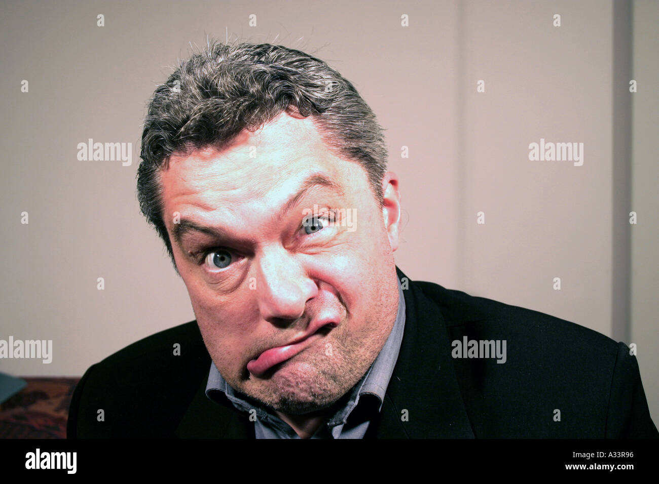 Funny male face distortion hi-res stock photography and images - Alamy