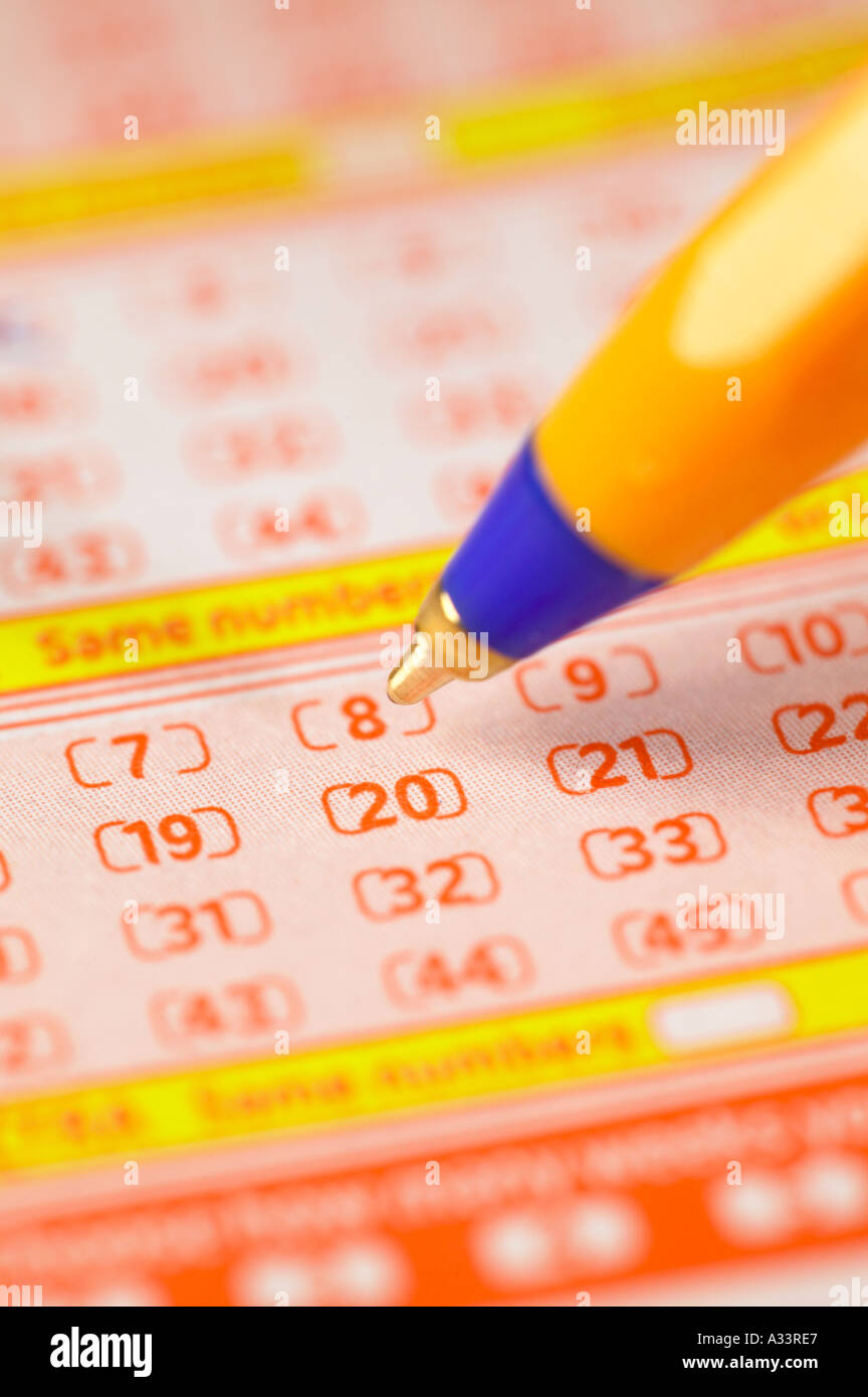 lottery ticket with pen Stock Photo - Alamy