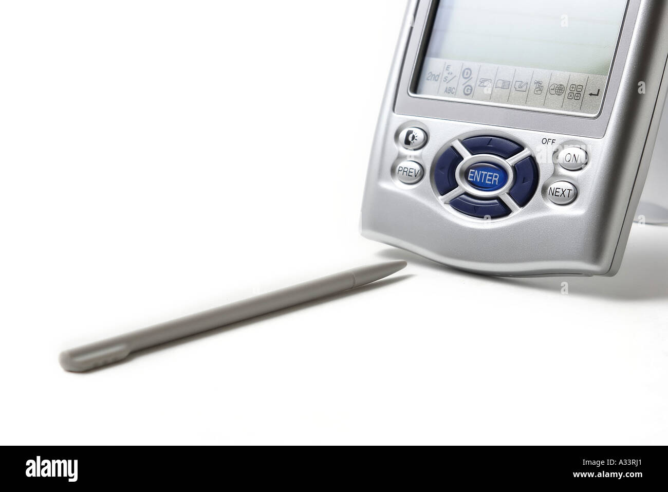 PDA face up with pen on white background Stock Photo - Alamy