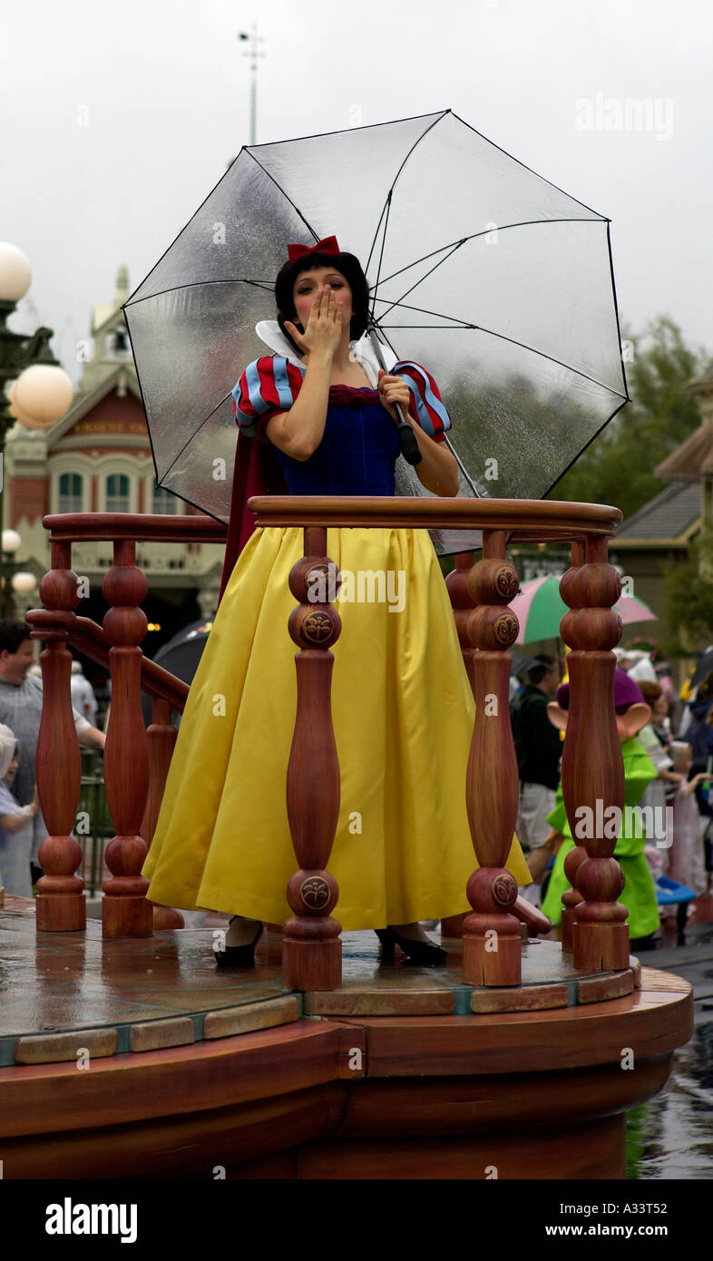 Snow white with brolly during parade at magic kingdom orlando florida ...