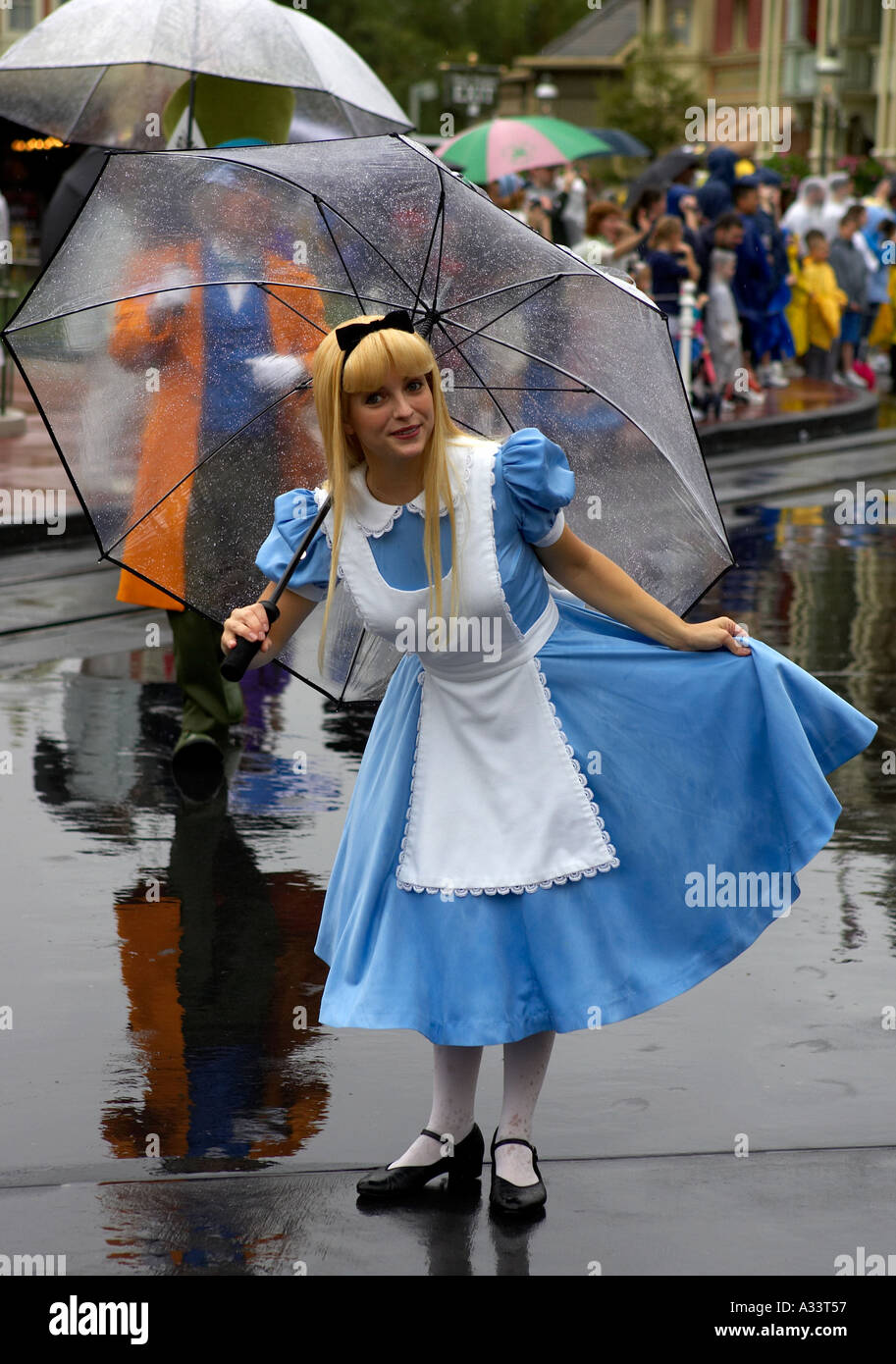 Alice with brolly during parade at magic kingdom orlando florida usa ...