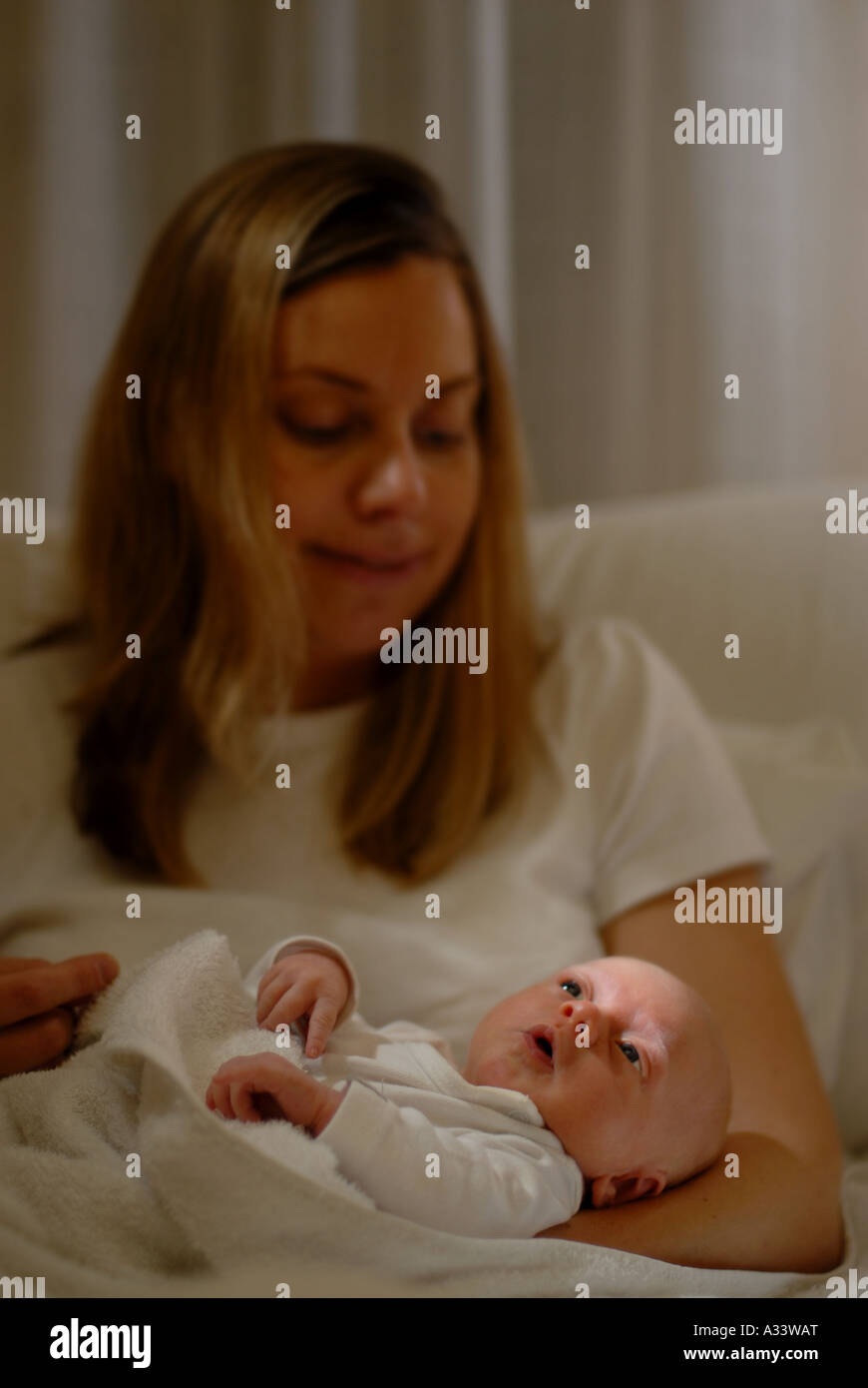 woman in bed admiring new born baby Stock Photo - Alamy