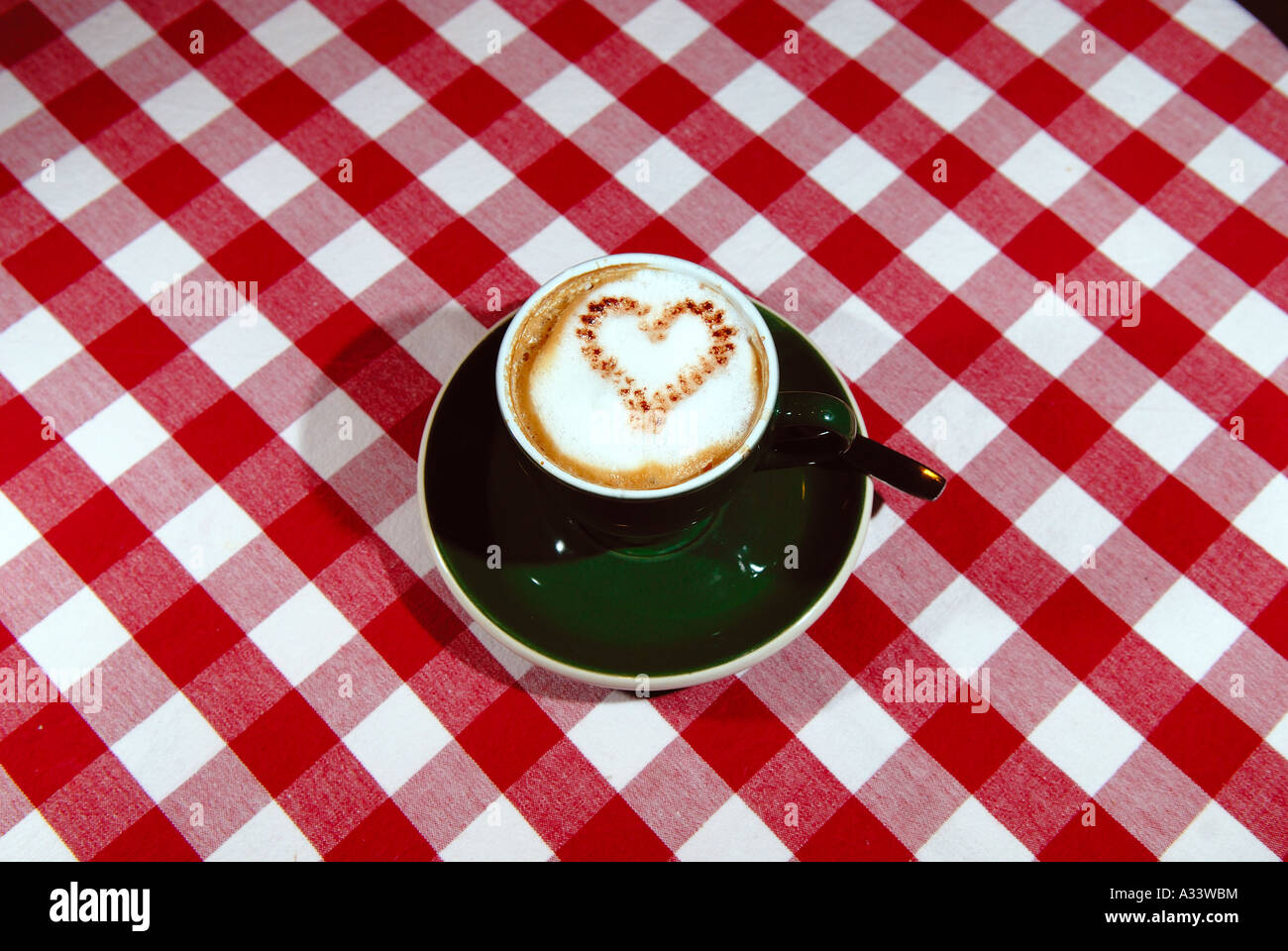 Cup of italien cappucino coffee with a love heart overhead shot wide ...