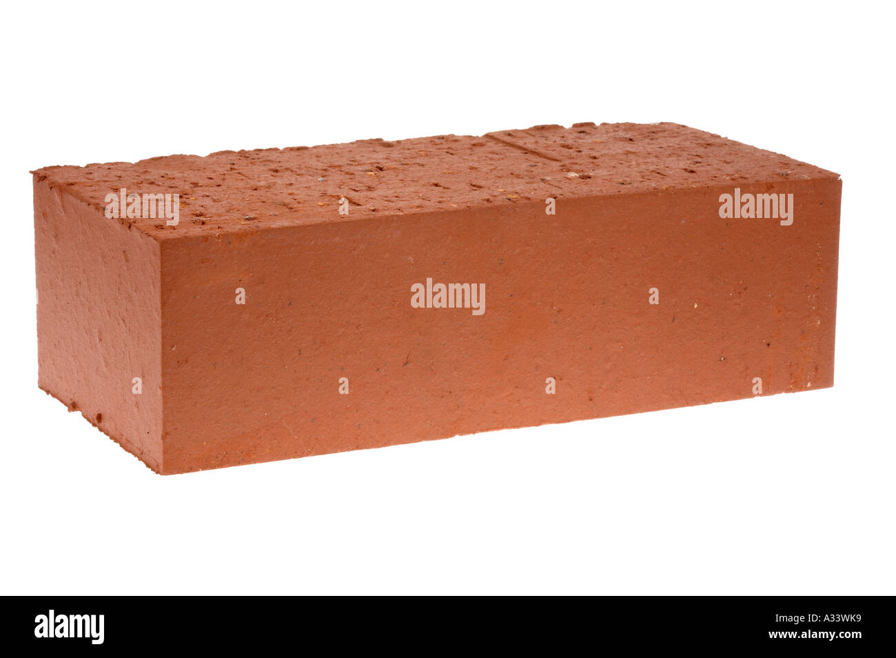Red solid brick on a white background Stock Photo - Alamy