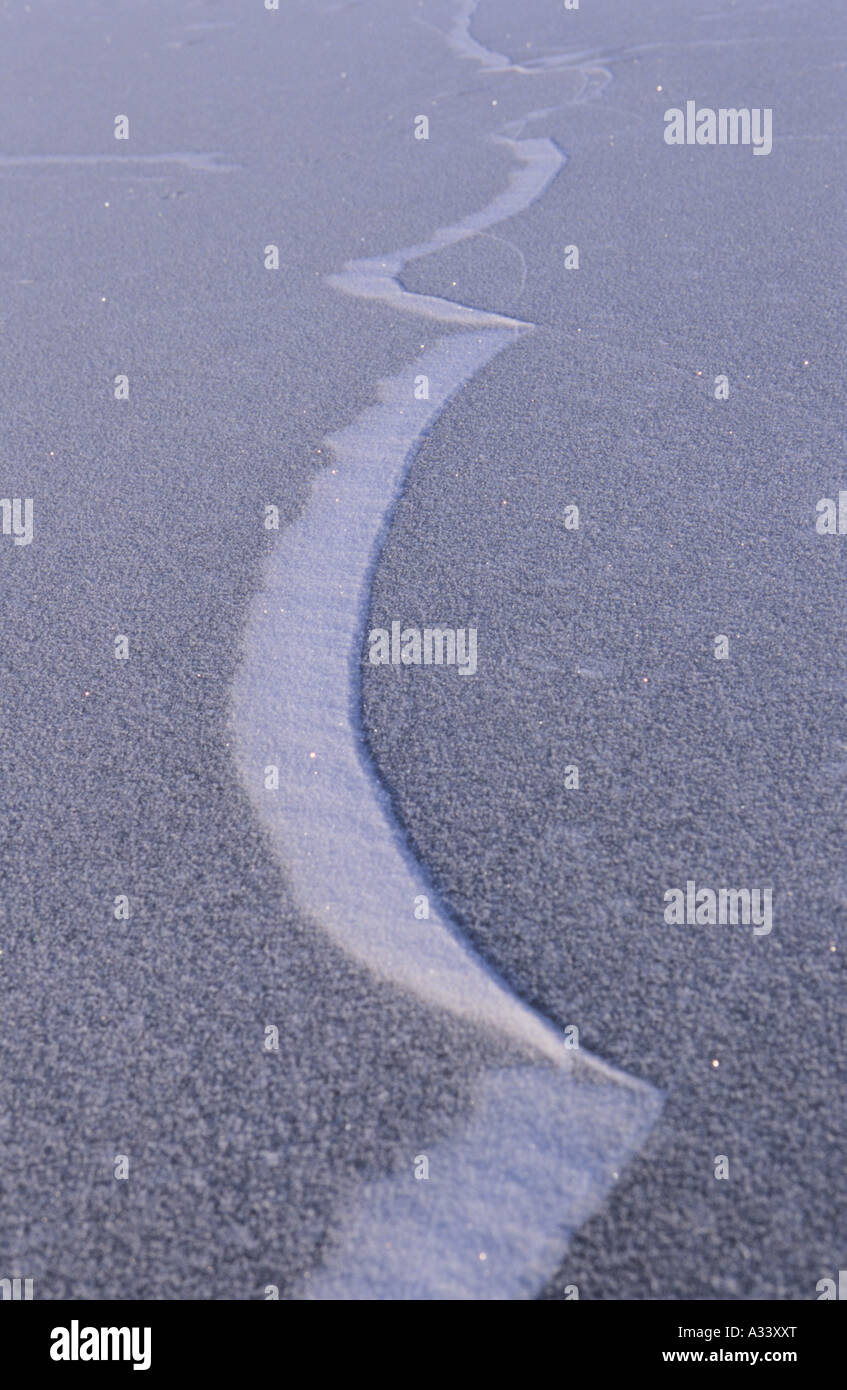 Crack on ice Stock Photo - Alamy