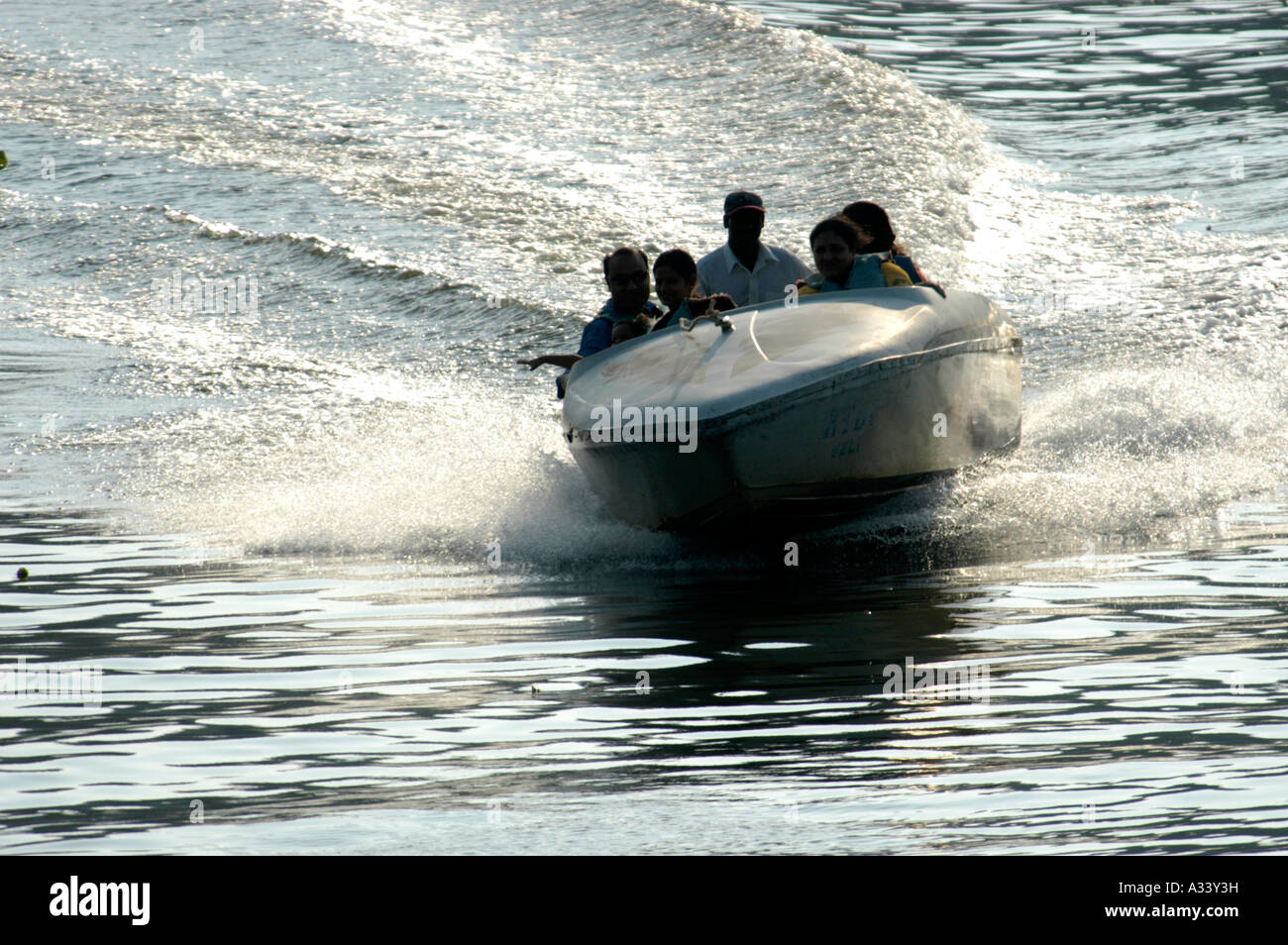 SPEED BOAT RIDING IN AKKULAM LAKE TRIVANDRUM Stock Photo - Alamy