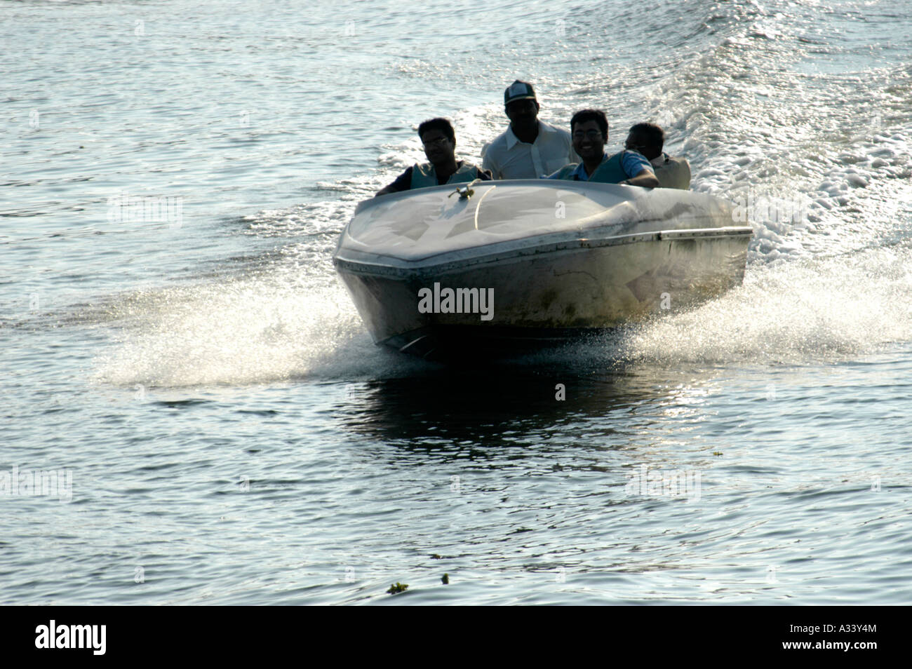 SPEED BOAT RIDING IN AKKULAM LAKE TRIVANDRUM Stock Photo - Alamy