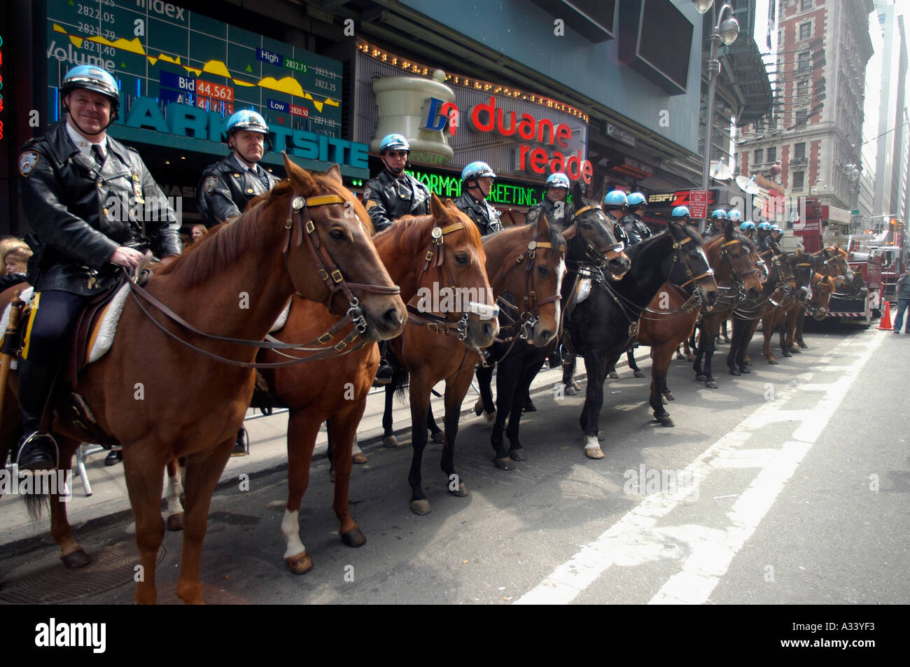 NYPD Mounted Officers muster in Times Square March 19 2005 prior to an ...