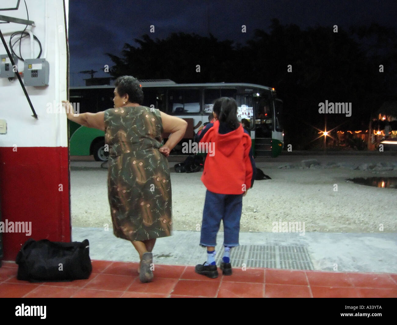 Woman child bus station hi-res stock photography and images - Alamy