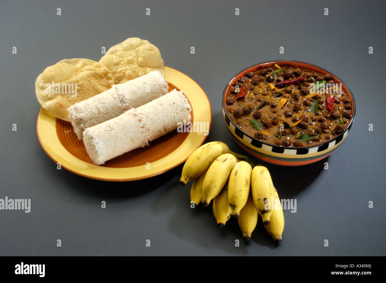 Puttu and kadala curry hi-res stock photography and images - Alamy