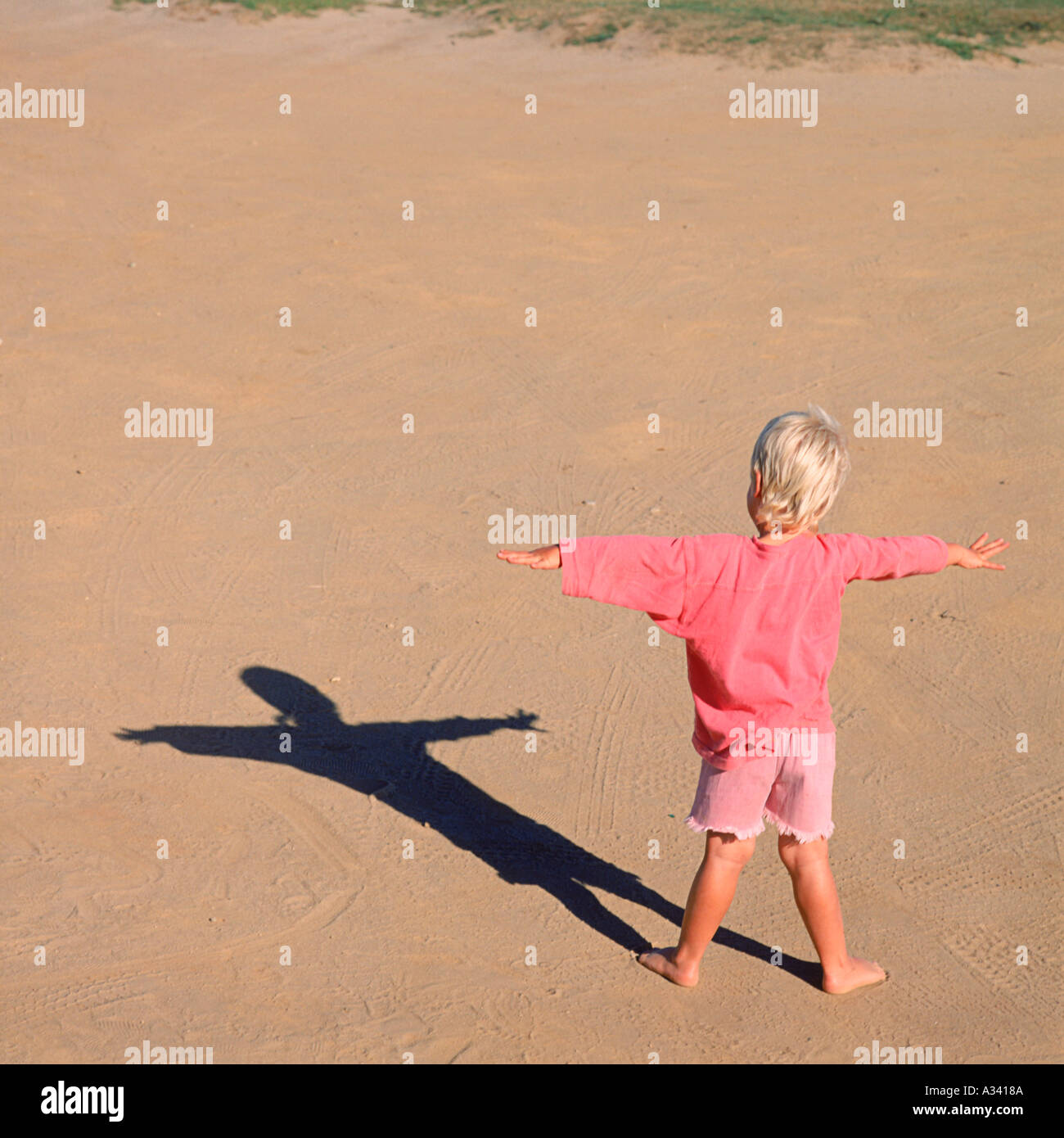 Back view of a boy shadows hi-res stock photography and images - Alamy