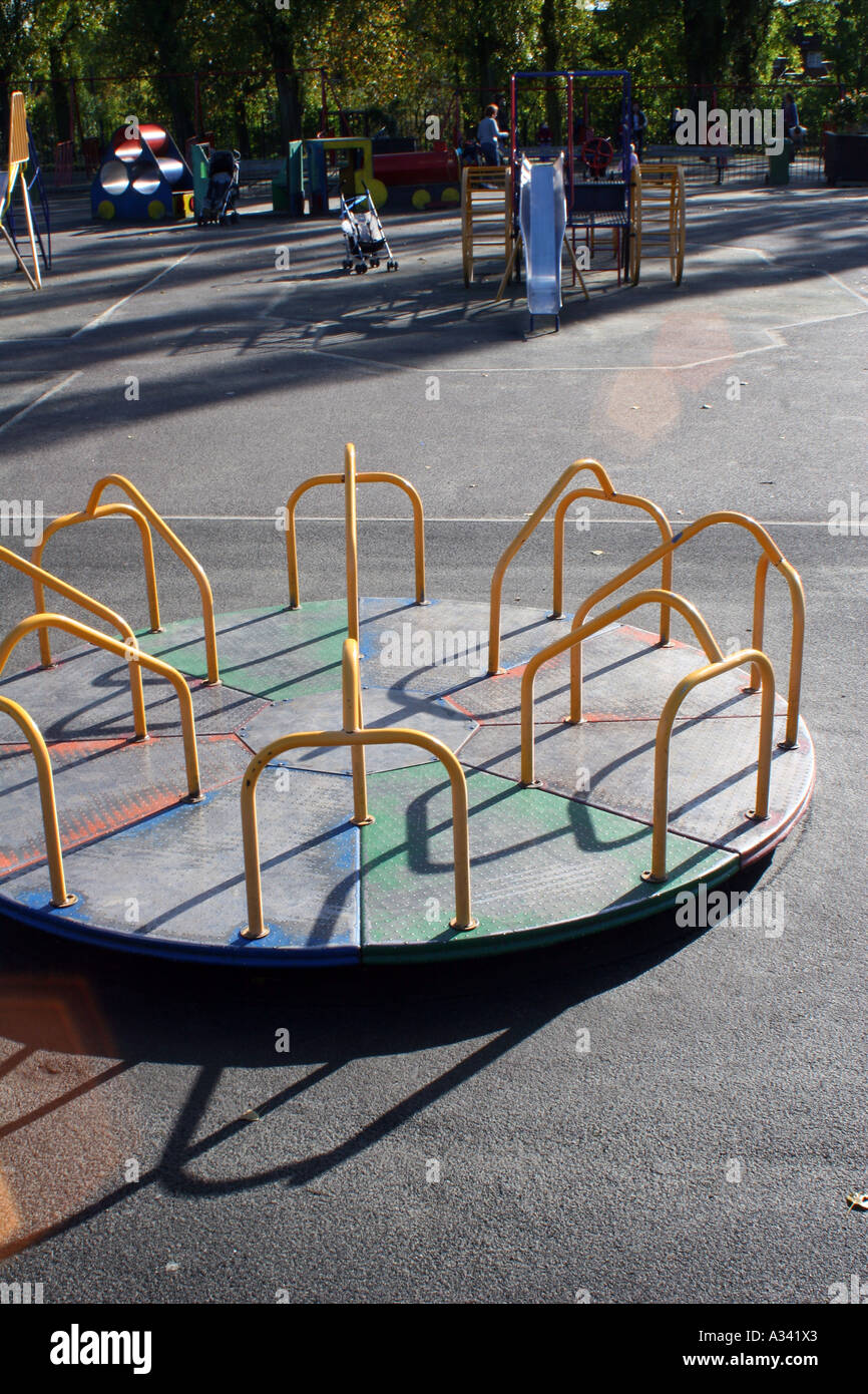 roundabout in a children's playground Stock Photo - Alamy