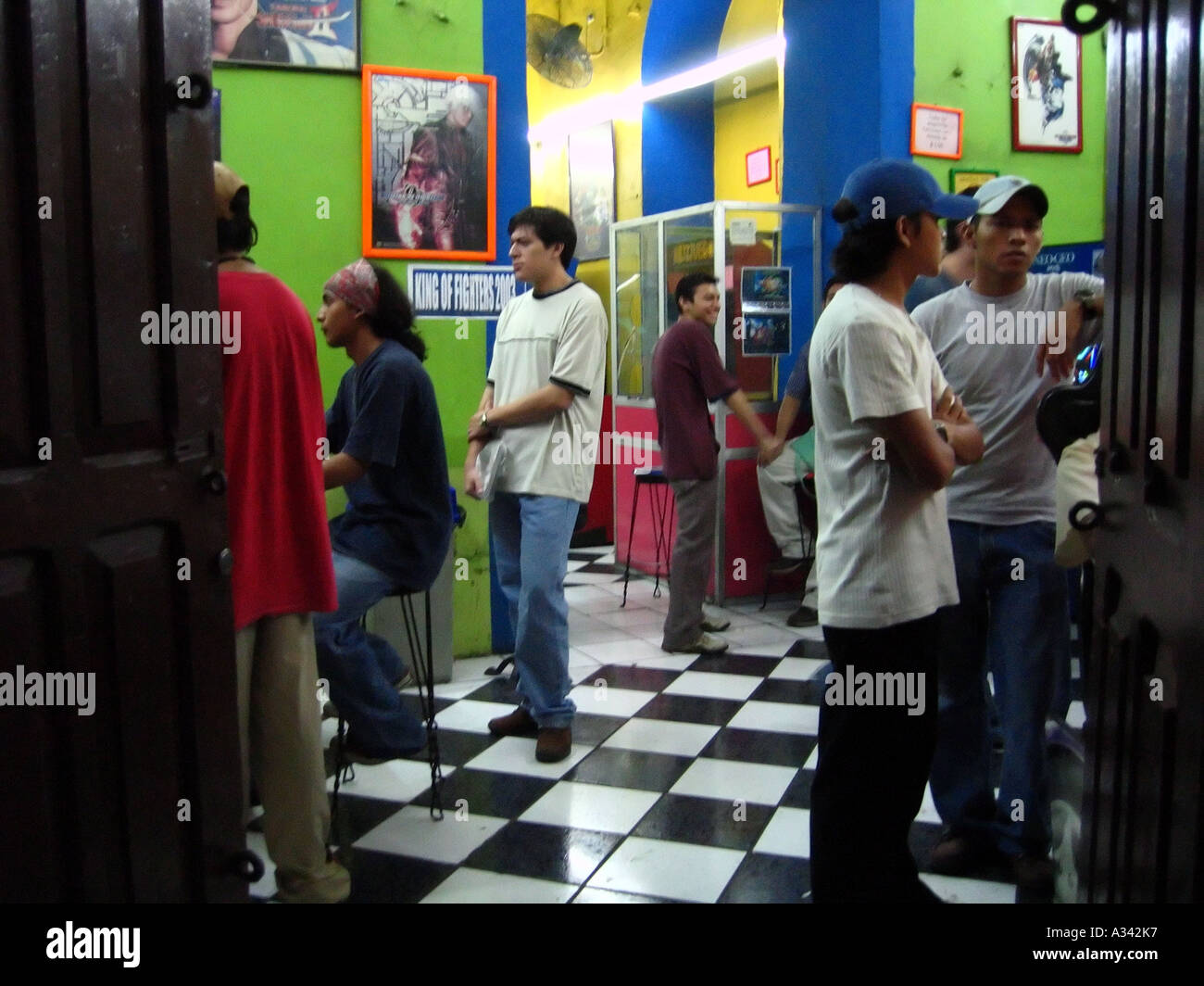 young men in amusement arcade, Mexico Stock Photo - Alamy