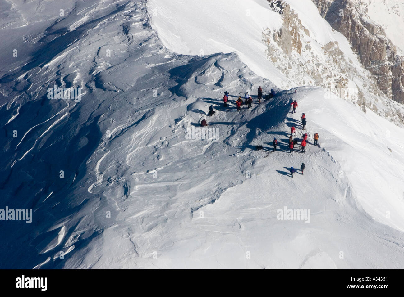 Climbers enjoy the view from 20,320' summit of Mt. McKinley, Denali ...