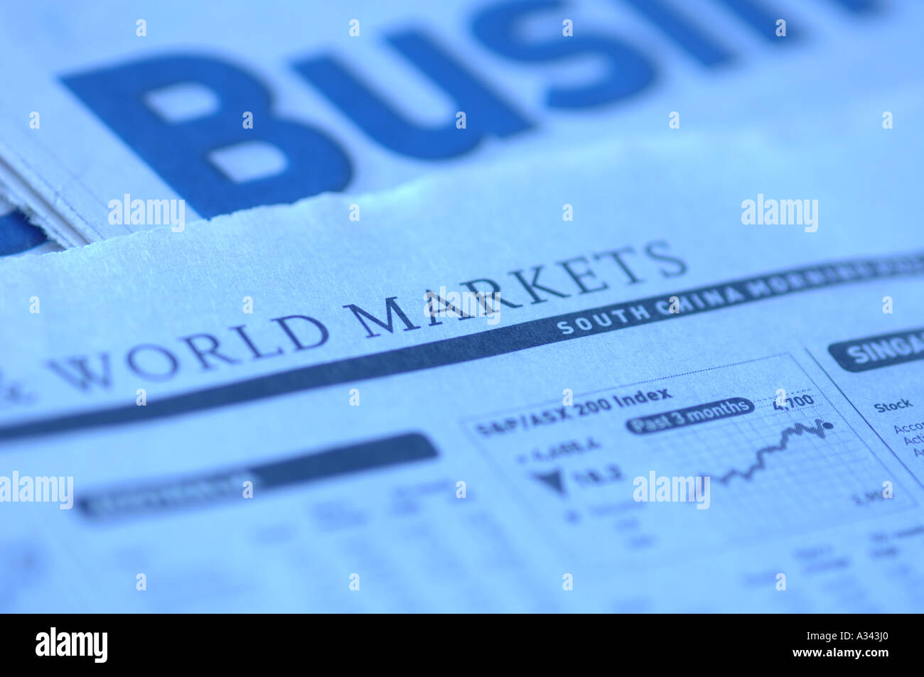 business newspaper with world market charts Stock Photo - Alamy