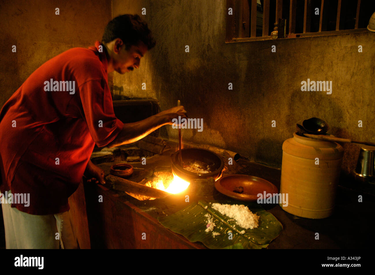 COOKING IN TRADITIONAL WAY IN KERALA HOUSE THRISSUR Stock Photo - Alamy
