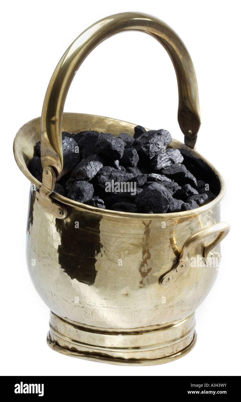 Coal in an old brass coal bucket Stock Photo - Alamy