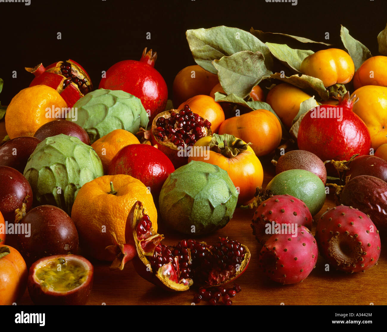 Agriculture mixed exotic fruits pomegranates hi-res stock photography ...
