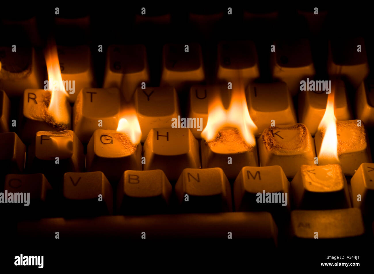 Horizontal Shot of a keyboard on fire Stock Photo - Alamy