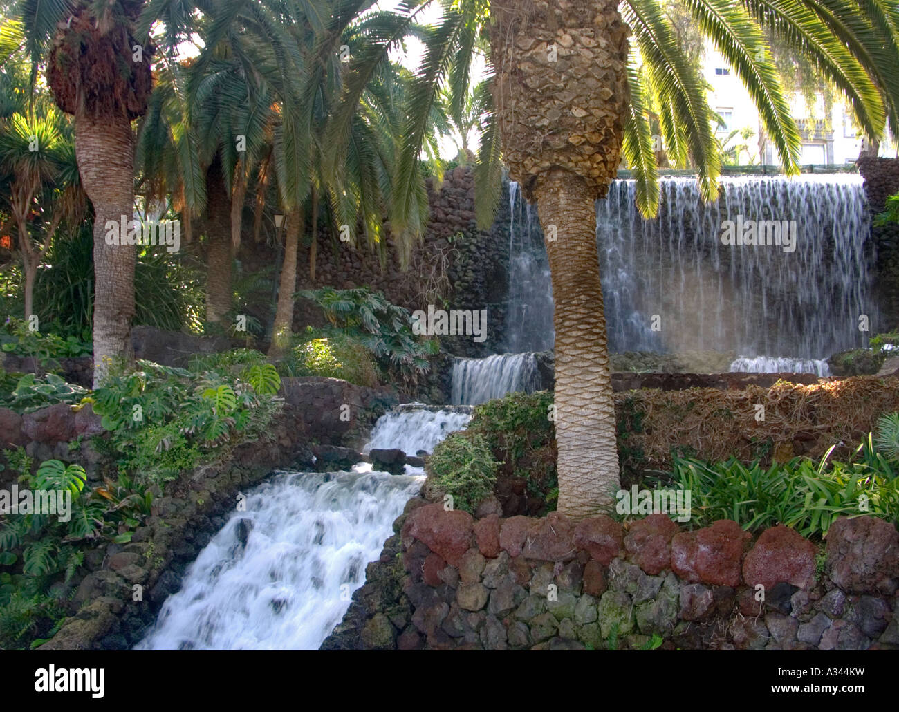Waterfalls in sub tropical gardens of the Parque de Taoro, Puerto de la ...