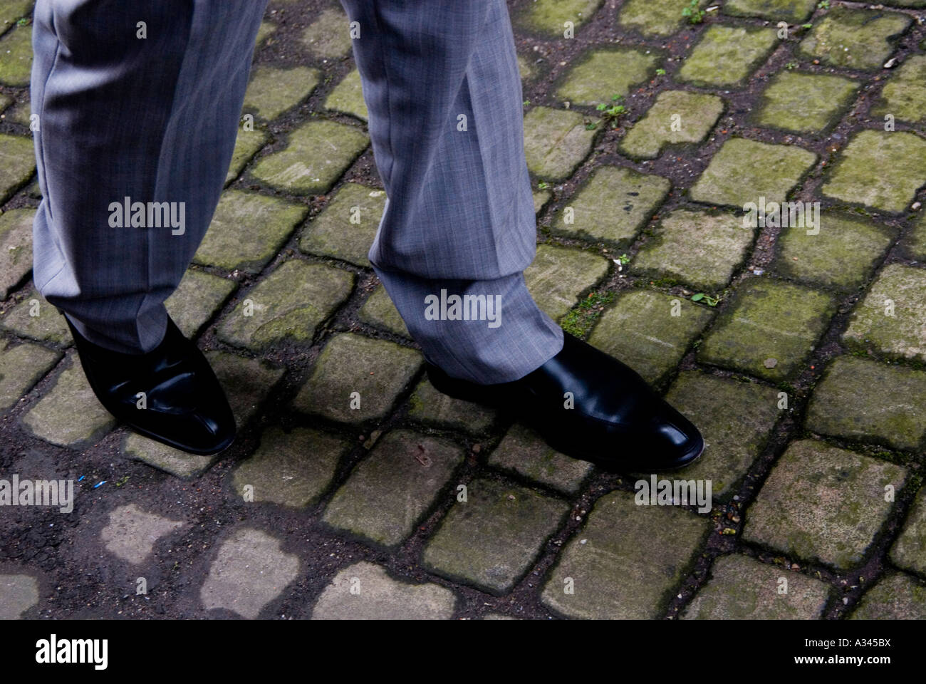 Legs of man walking Stock Photo - Alamy
