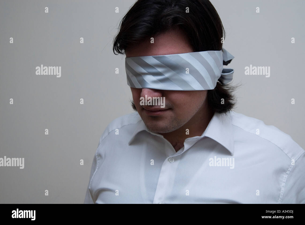 He blindfolded hi-res stock photography and images - Alamy