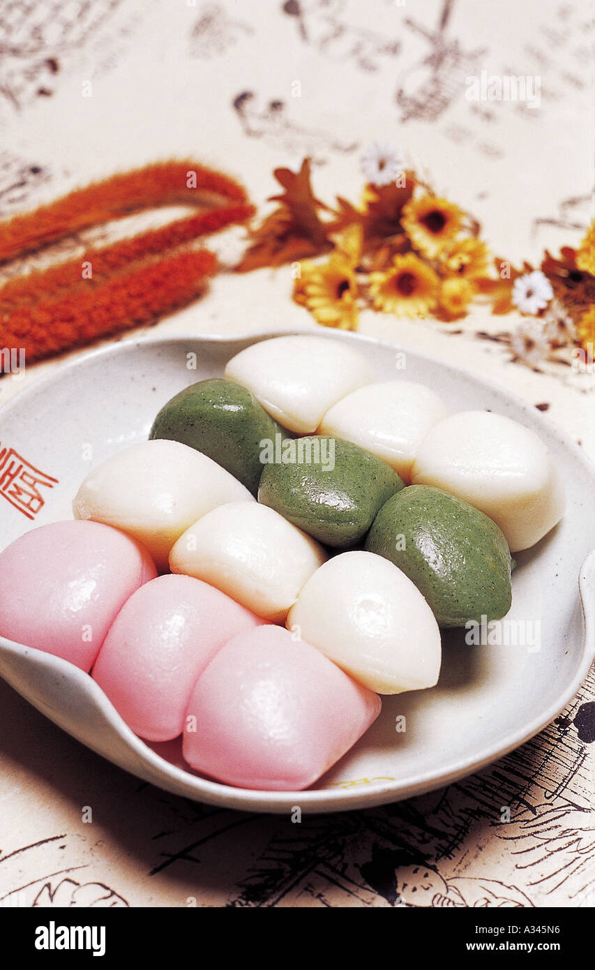 A closed view on Korean rice cakes served in a dish Stock Photo - Alamy