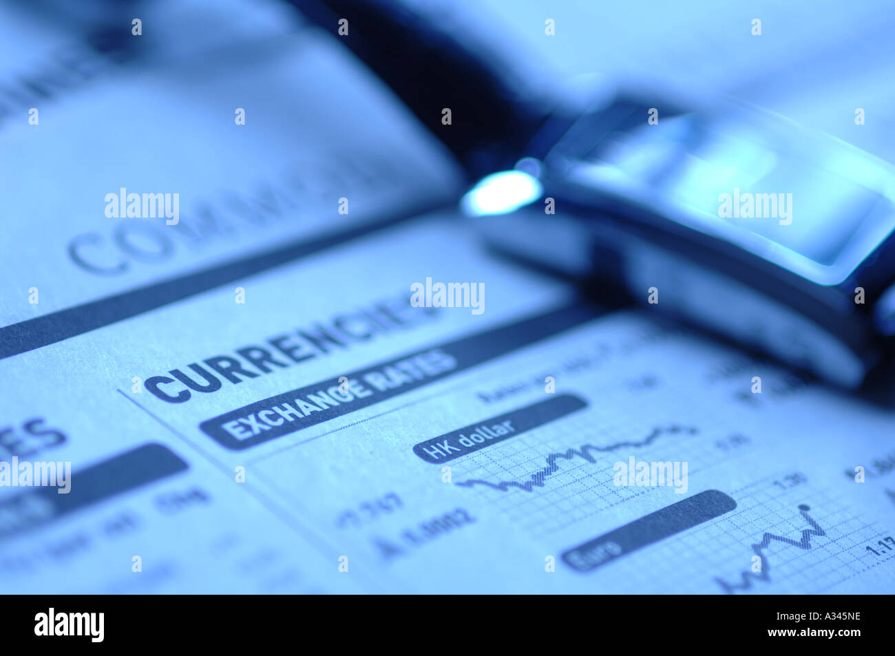business, currencies chart newspaper with watch on the side Stock Photo ...