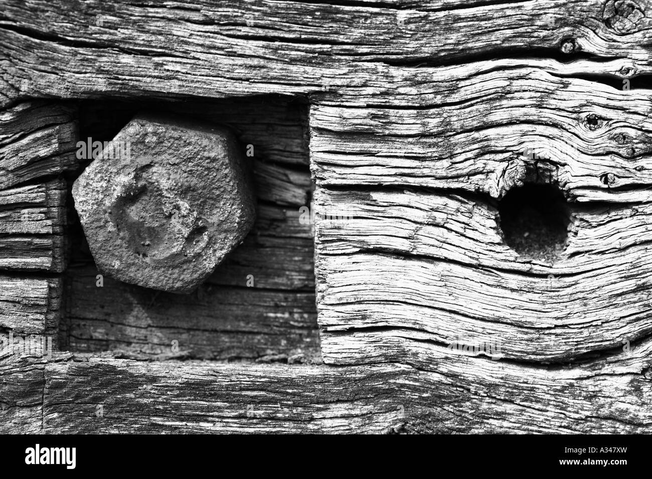 Aged wood, nuts and bolts Stock Photo - Alamy