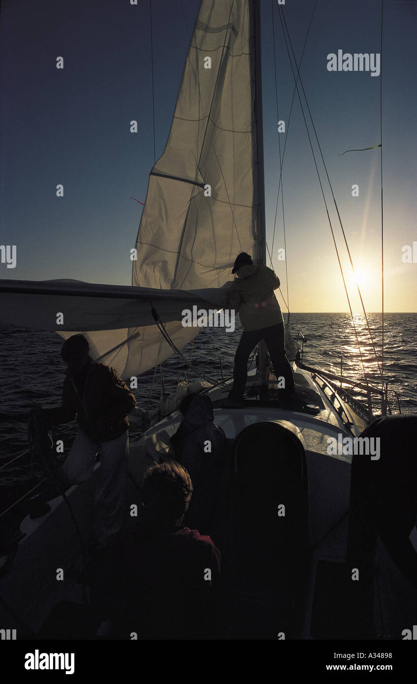 Sailing Into The Sun Stock Photo - Alamy