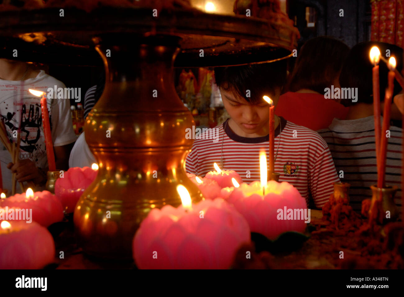 Worshipper at Kuan Yin Teng Temple, Georgetown, Penang, Malaysia Stock ...