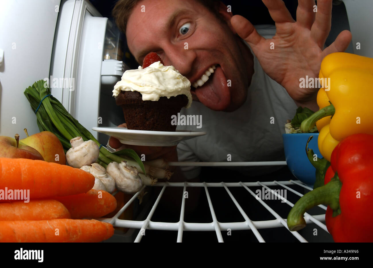 Boy looking in refrigerator hi-res stock photography and images - Alamy