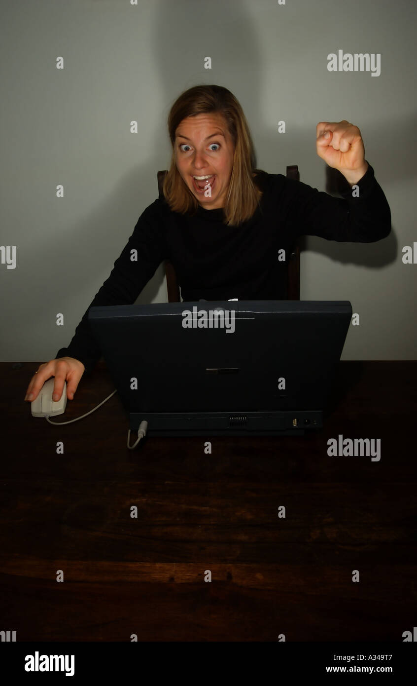 Woman pulling face and desk hi-res stock photography and images - Alamy