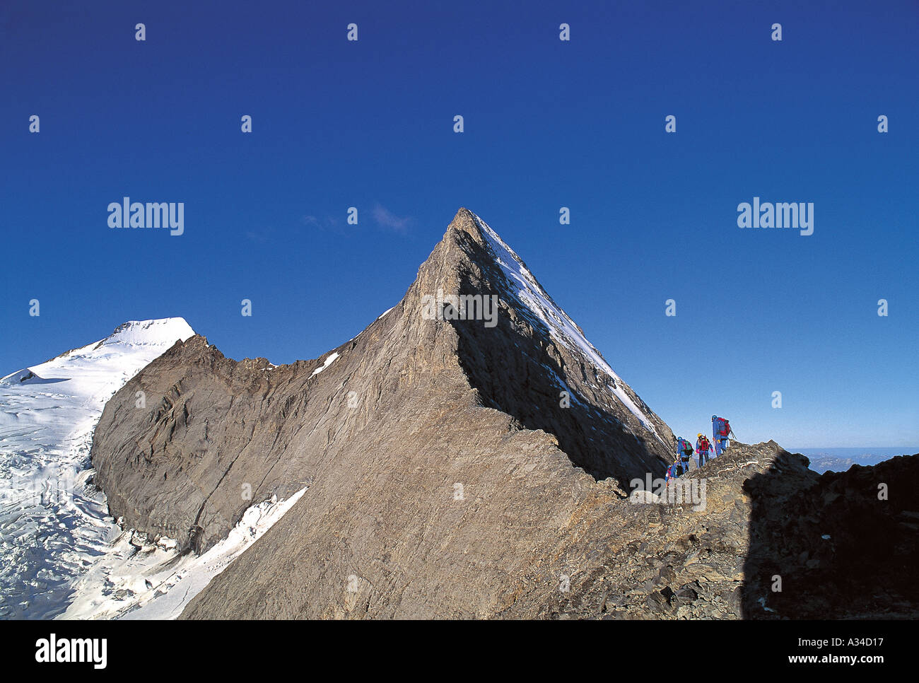 Climbers on mittellegi ridge eiger hi-res stock photography and images ...