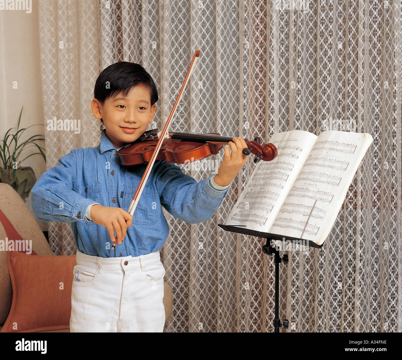 Man Violin Child Boy High Resolution Stock Photography and Images - Alamy