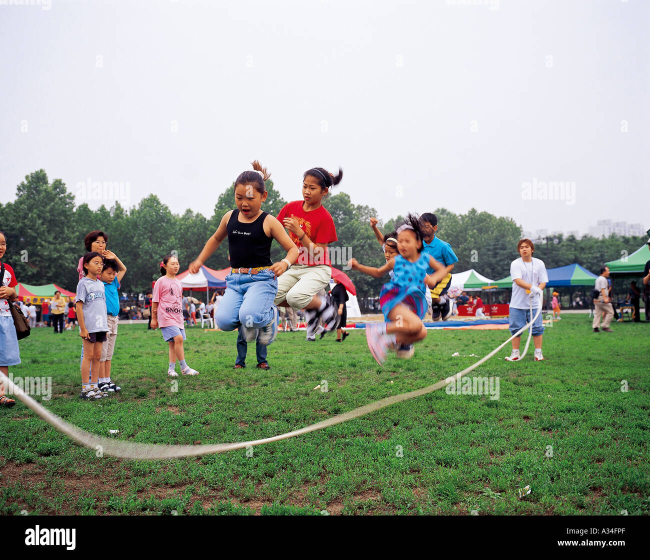 Jumping Rope Children High Resolution Stock Photography and Images - Alamy