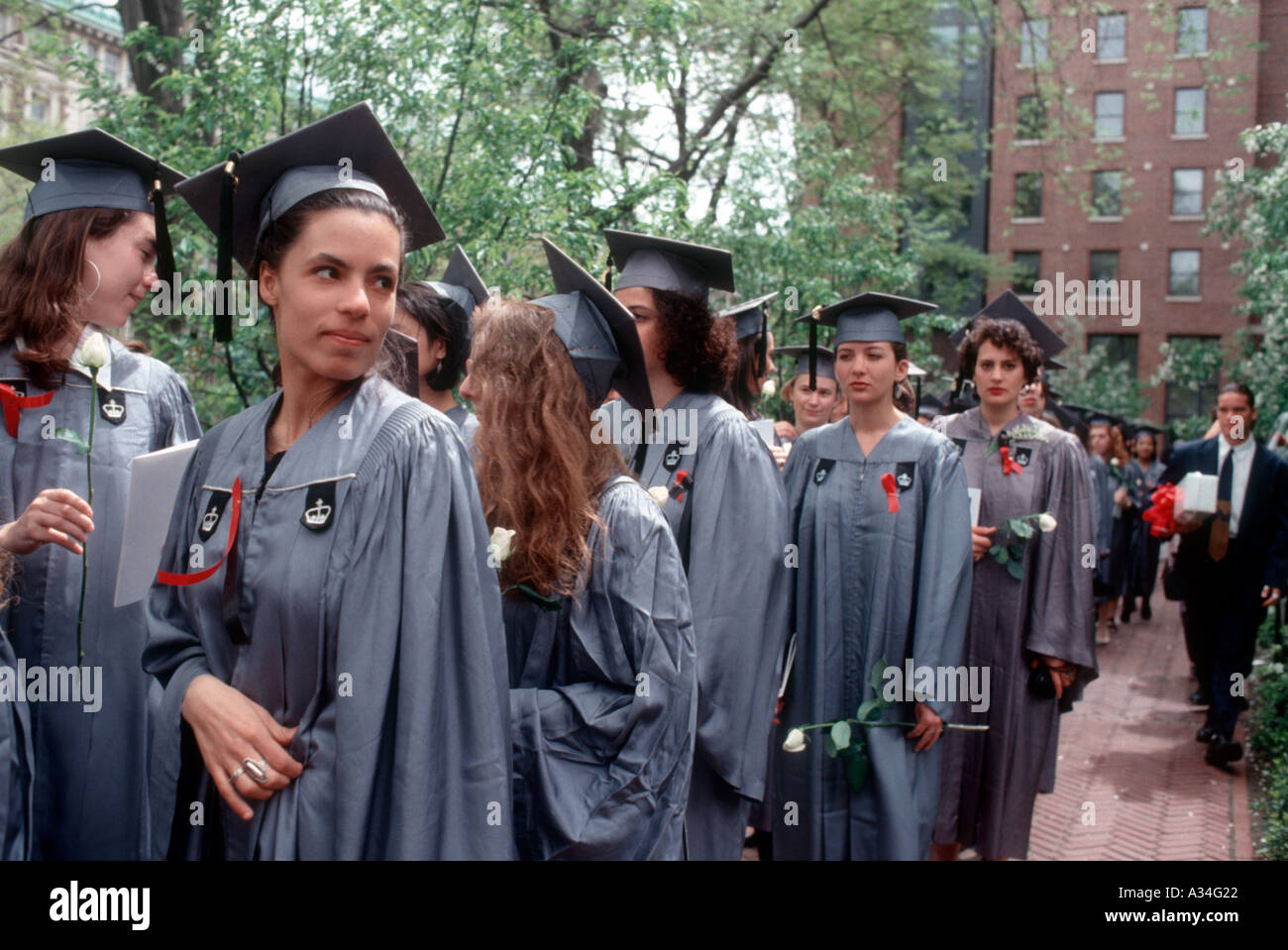 Graduates at Barnard College enter the campus for commencement ...