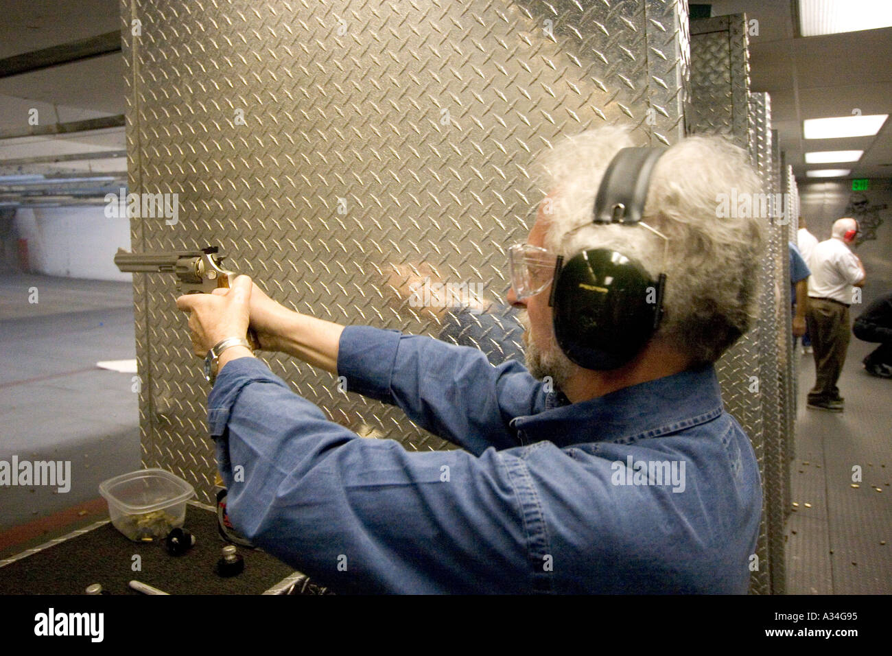 Male shooter at target practice Las Vegas Nevada Shooting gallery Stock ...