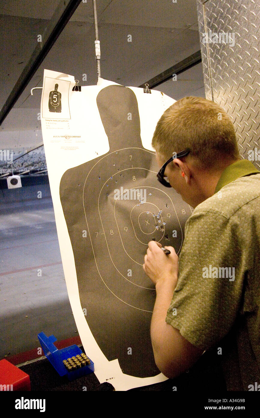 Male shooter at target practice Las Vegas Nevada Shooting gallery Stock ...