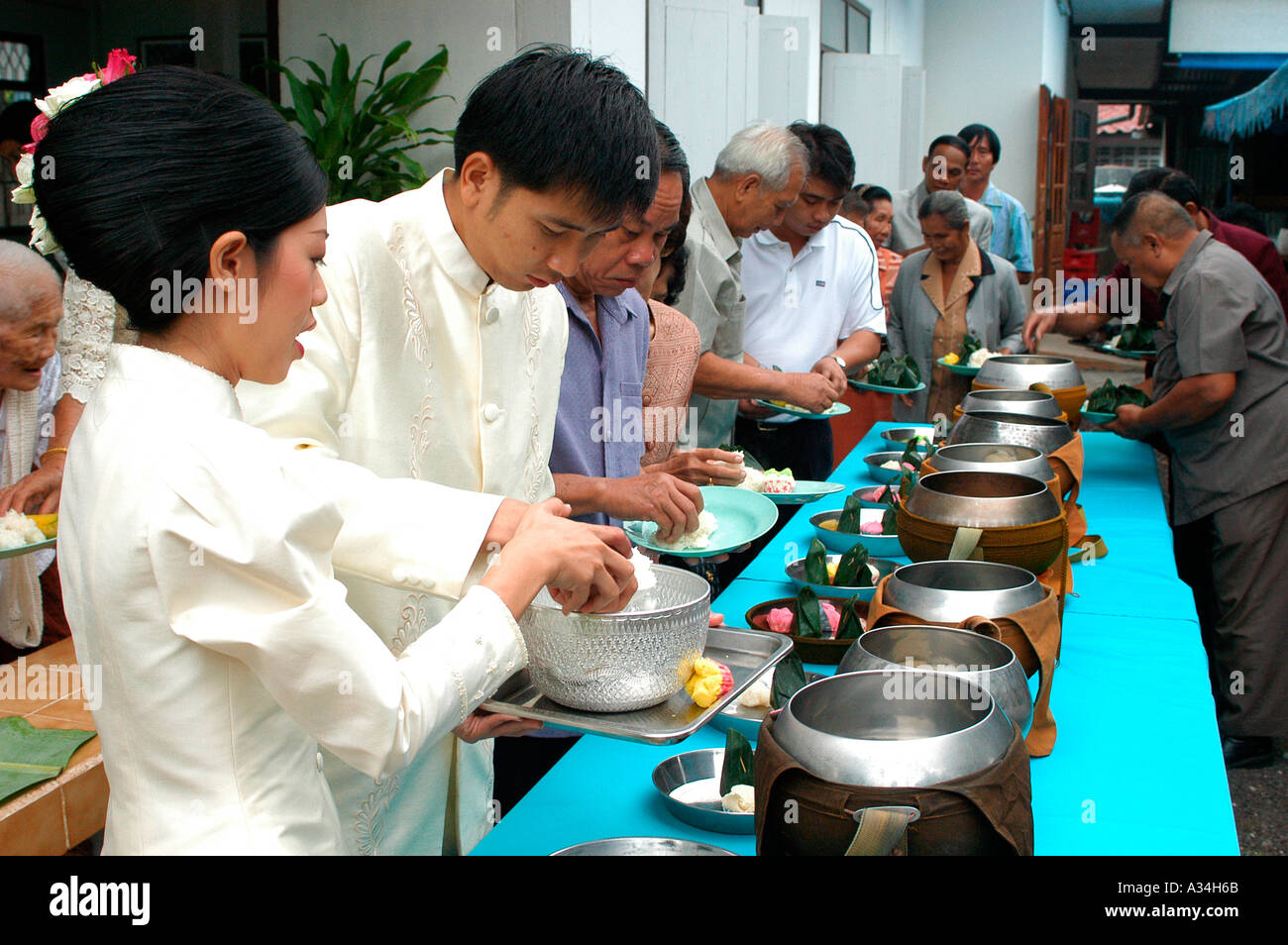serving up food at a traditional Thai wedding Thailand MR Stock Photo ...