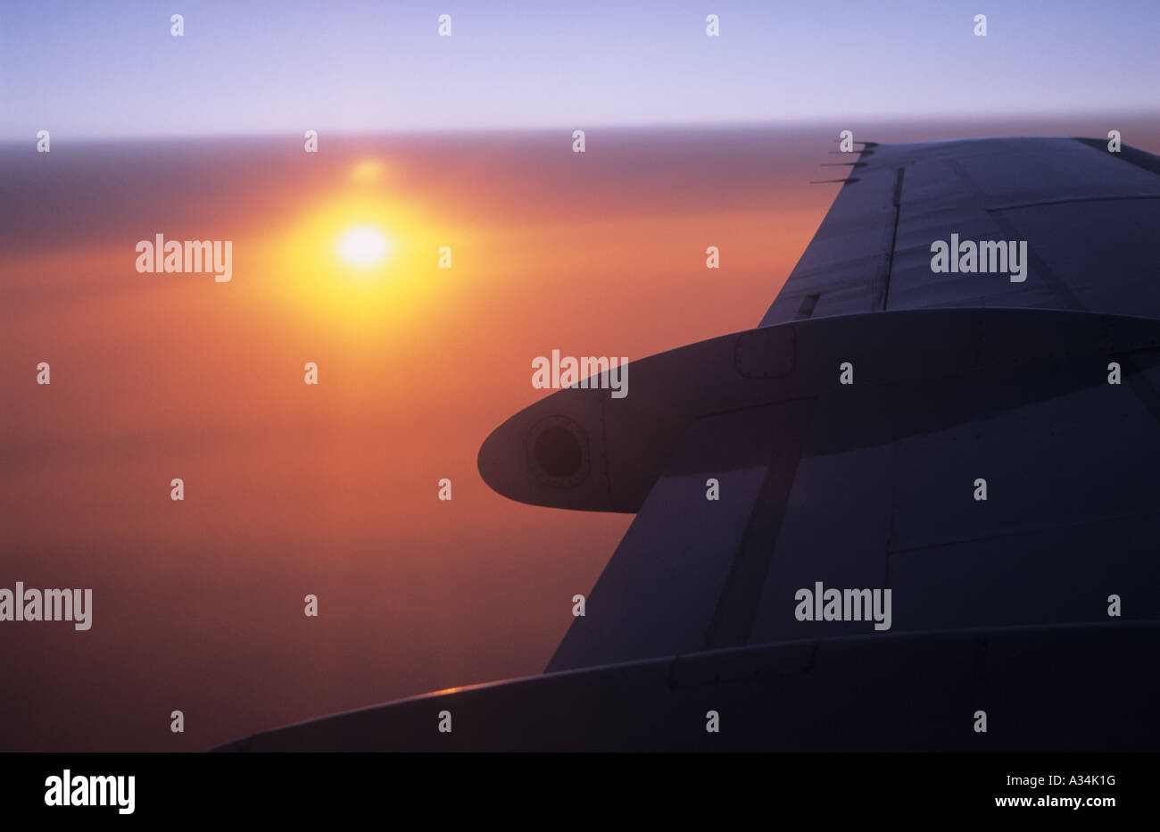 Airplane wings in sunset hi-res stock photography and images - Alamy